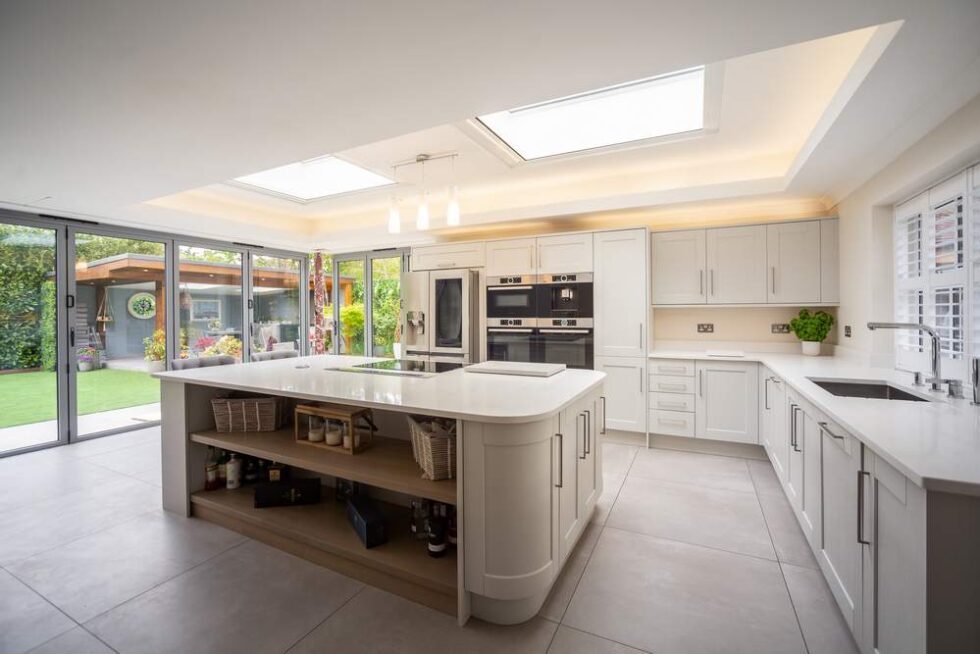 Howdens Dove Grey Shaker Kitchen with Island & Granite Worktops ...